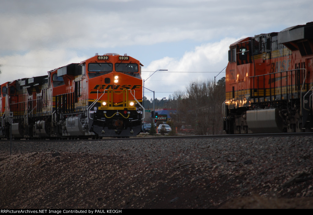 BNSF 6939 A Very, Very Brand New ES44C4 gets ready to pass BNSF 7562.